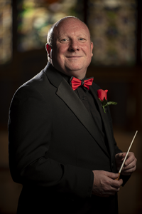 Our band conductor, Simon Nicholls - Bournemouth and District Concert Band